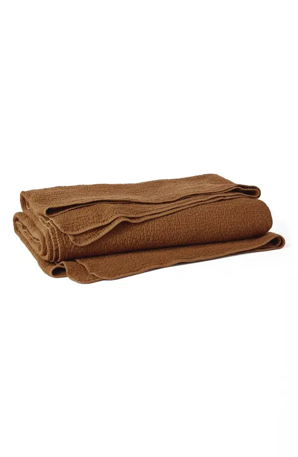 Coyuchi Cascade Matelassé Organic Cotton Blanket Rust Editorialist