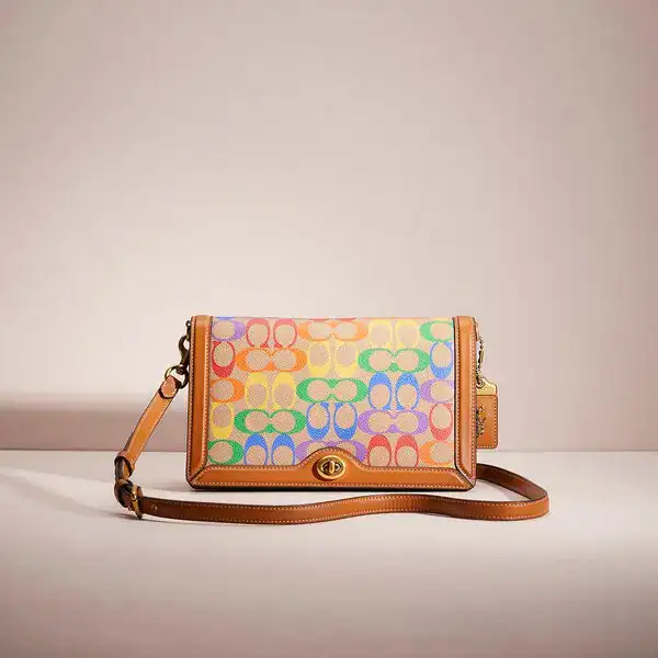 Coach Restored Riley In Signature Canvas - Brass/rust | Editorialist