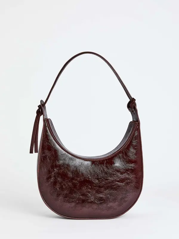 REFORMATION Medium Rosetta Shoulder Bag - Rum Raisin Crinkle Patent