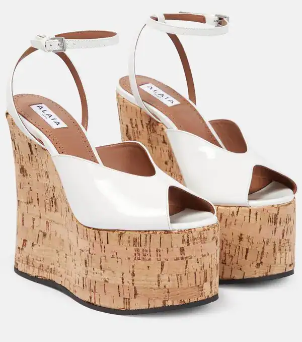AlaïA Patent Leather Wedge Sandals White Editorialist