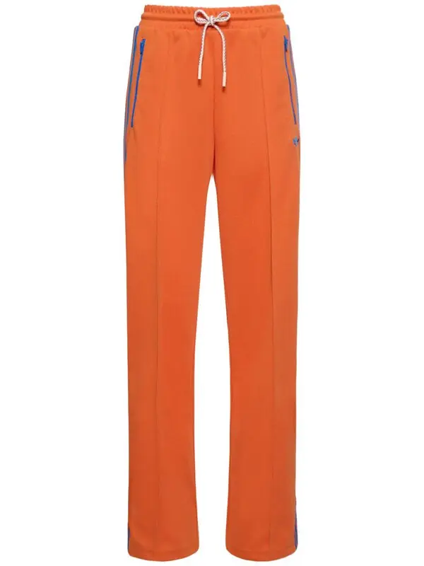 ADIDAS ORIGINALS Montreal Track Pants Orange Editorialist