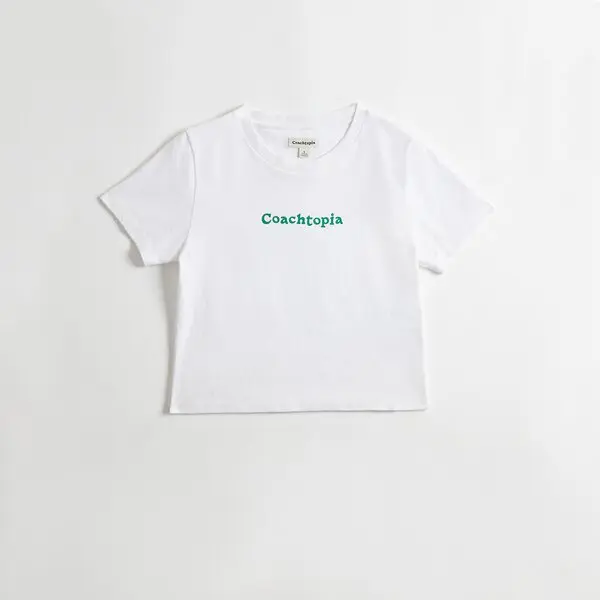 COACHTOPIA Baby In 97% Recycled Cotton: Logo - White | Editorialist