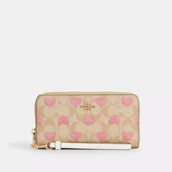 Buy COACH OUTLET Long Zip Around Wallet In Signature Canvas With Heart ...