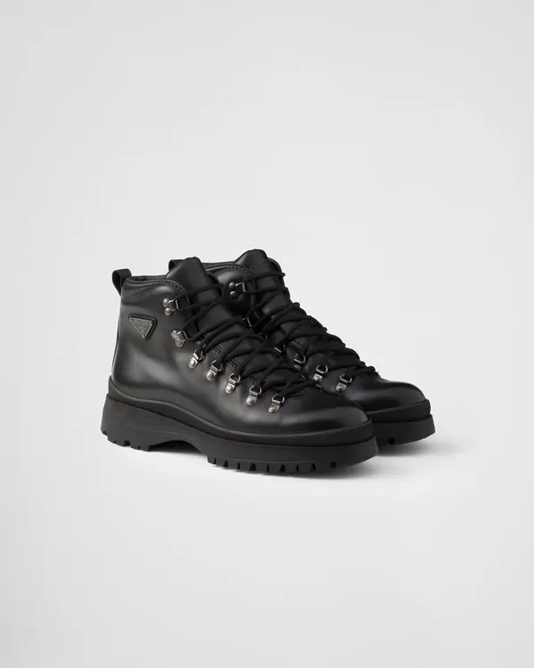 Prada Brixxen Leather Ankle Boots - Black