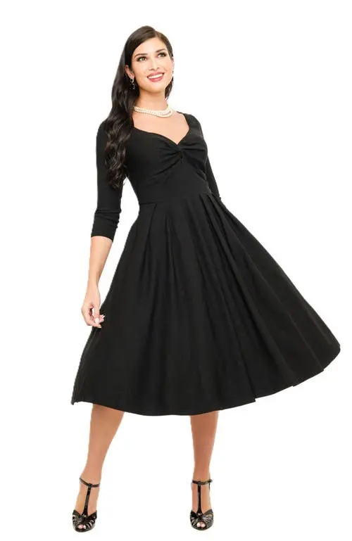 Unique Vintage 1950s Front Twist Swing Dress