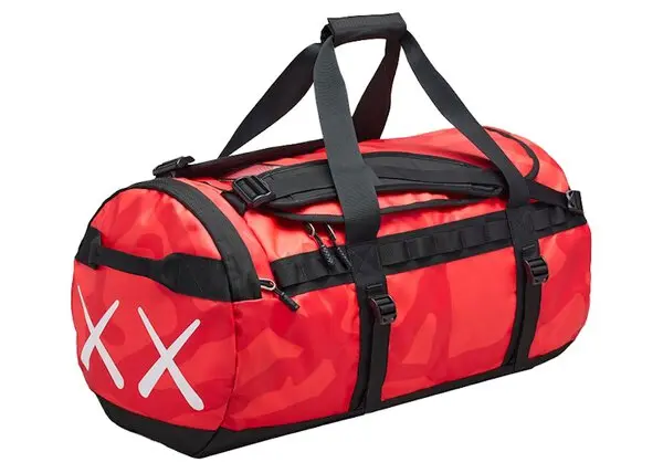 KAWS X The North Face Duffle Bag - Brilliant Coral 86 Print