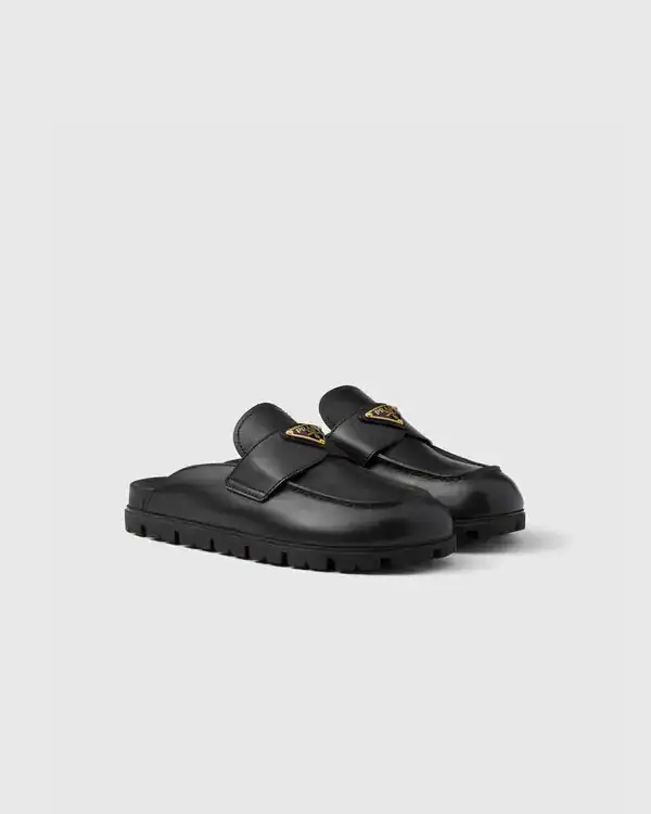Prada Leather Mules - Black | Editorialist