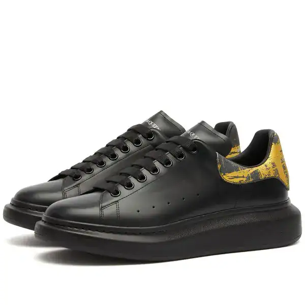 Alexander Mcqueen Snake Heel Tab Oversized Sneakers In Black/Gold