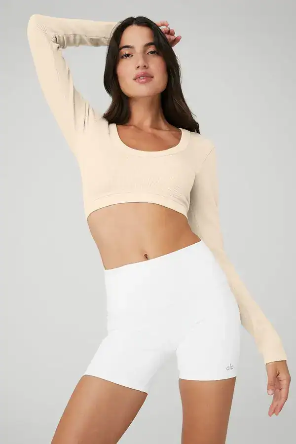 Alo Yoga Seamless Ribbed Cropped Serene Long Sleeve Top In Beige