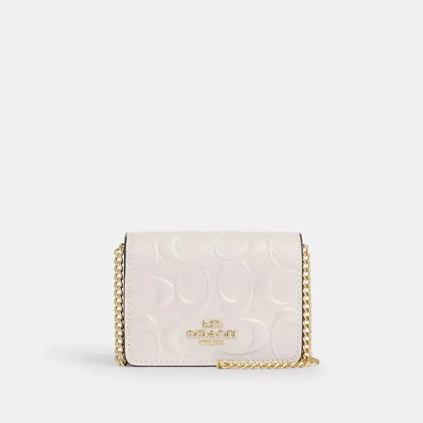 Buy COACH OUTLET Mini Wallet On A Chain In Signature Leather - Gold At ...