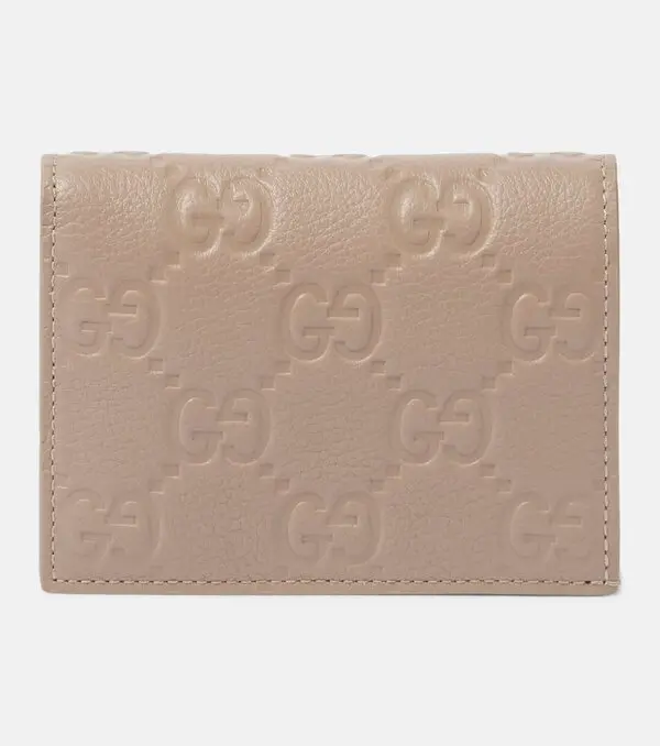 Gucci Gg Mini Debossed Leather Wallet - Beige