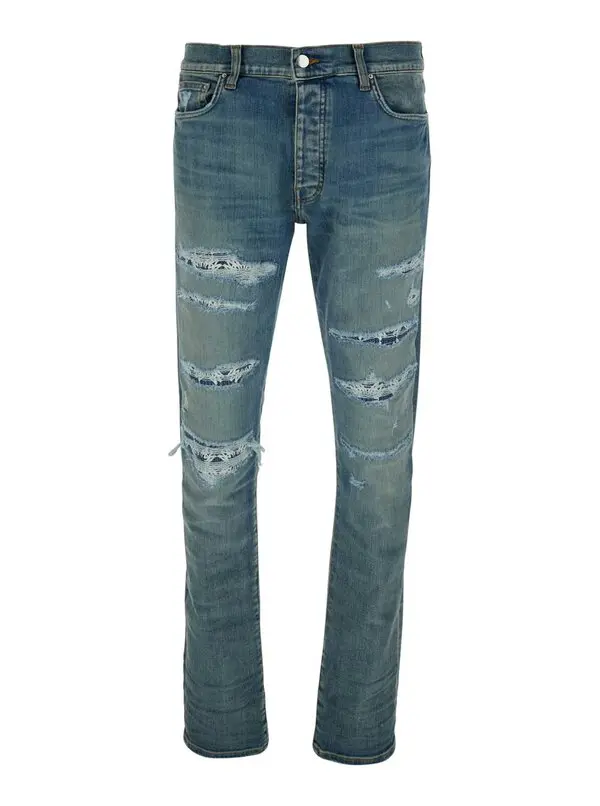 Amiri Jeans With Ripped Details And Logo Patch