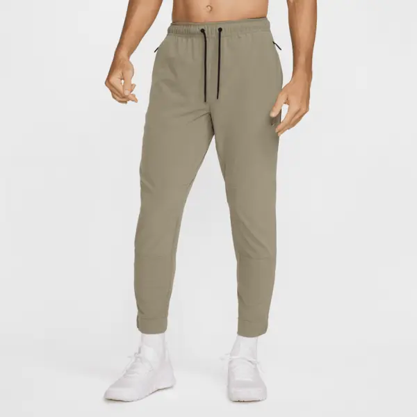 Nike Unlimited Dri-fit Zippered Cuff Versatile Pants - Green
