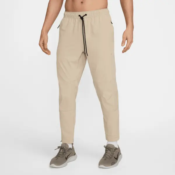 Nike Unlimited Dri-fit Zippered Cuff Versatile Pants - Brown