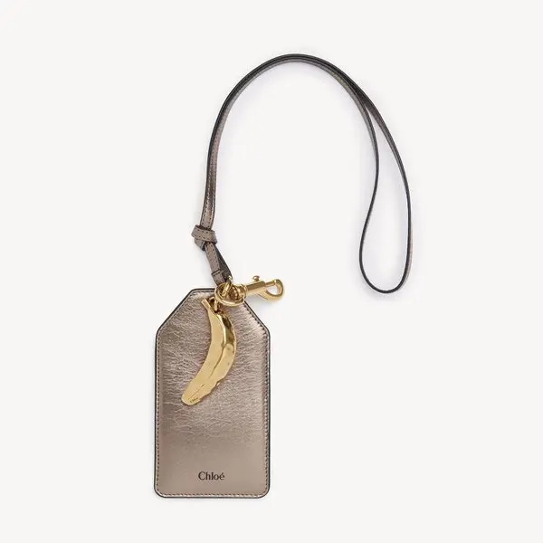 Chloé Symbols Banana Tag In Metallized Leather - Grey