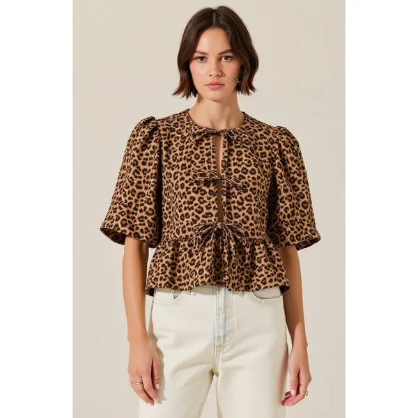 MODENAIRE Peplum Top With Tie Closures And Puff Sleeves