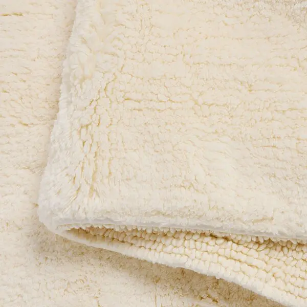 HUDSON PARK COLLECTION Reversible Bath Rug 21 X 34 Exclusive - Fresh Vanilla