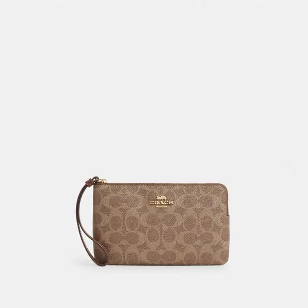 COACH® Corner Zip Wristlet In Signature Canvas