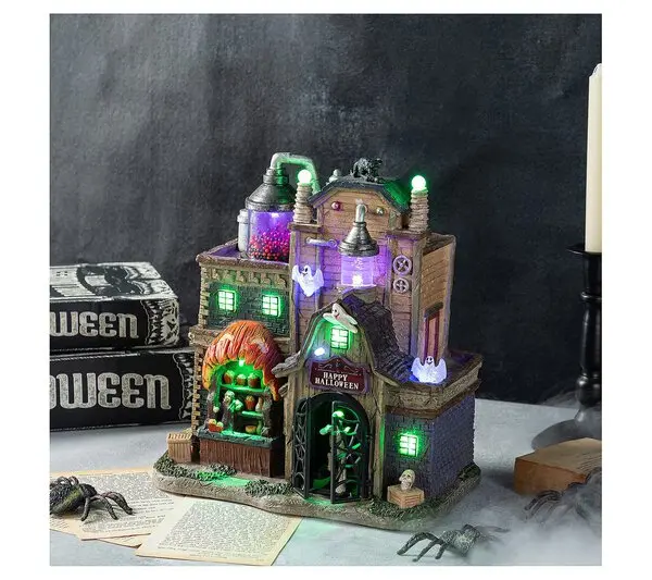 GLITZHOME 11'h Lighted Resin Halloween Haunted House Village