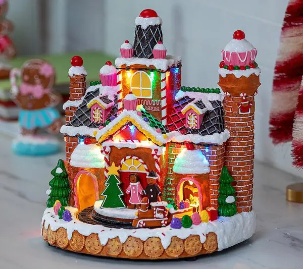 EVERGREEN 11'h Led Musical Gingerbread House & Moving Train