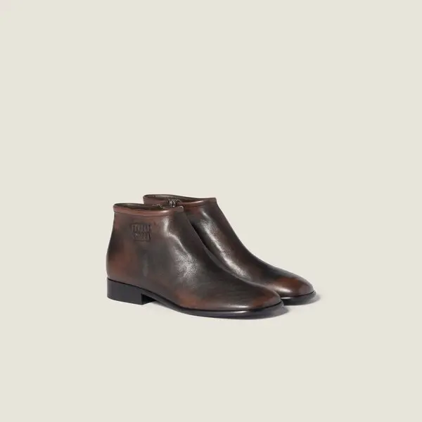 Miu Miu Fumé Leather Booties