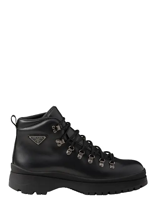 Prada Brixxen Leather Ankle Boots With Triangle Plaque - Black