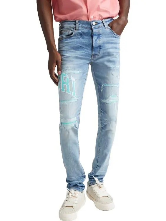 Amiri Varsity Logo Rip And Repair Skinny Fit Jeans - Perfect Indigo