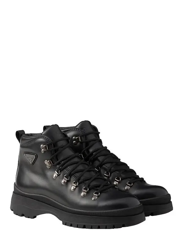 Prada Brixxen Leather Booties - Black