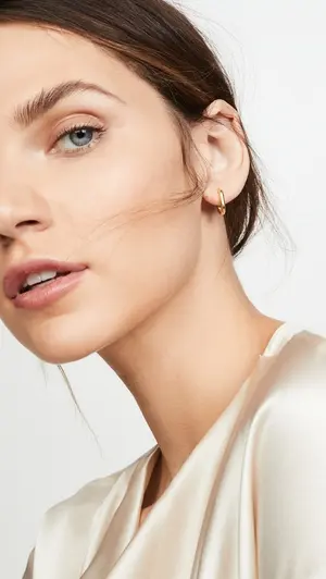 Shashi Cosmo Huggie Earrings - Gold