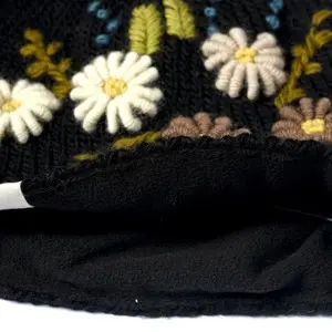 NIRVANNA DESIGNS Hand-knit Wool Bloom Hat With Embroidered Floral Detail - Black
