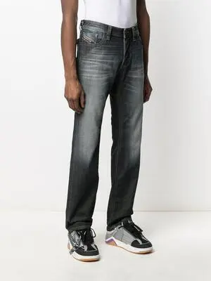 DIESEL® Faded Bootcut Jeans