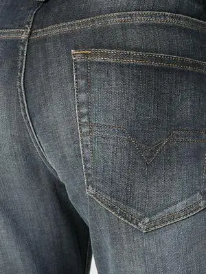 DIESEL® Faded Bootcut Jeans