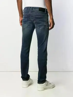 DIESEL® Thommer Jogg Jeans Dark Wash With Ripped Details - Blue