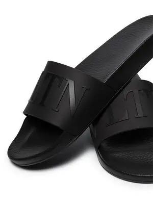 Valentino Garavani Embossed-logo Flip-flops - Black