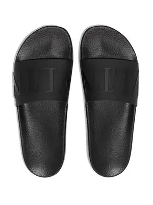 Valentino Garavani Embossed-logo Flip-flops - Black