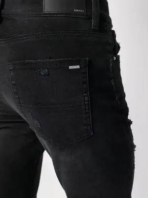 Amiri Distressed Skinny Jeans