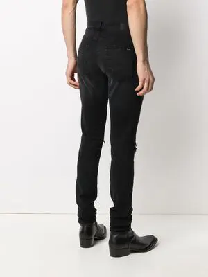 Amiri Distressed Skinny Jeans