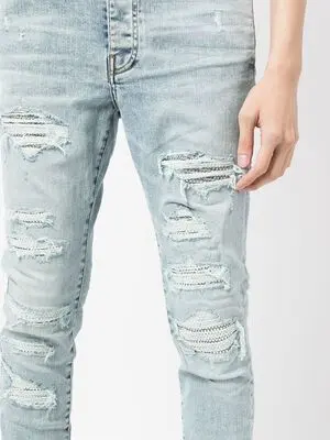 Amiri Distressed Skinny Jeans