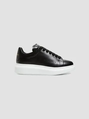 Alexander McQueen S Oversized Embossed Logo Leather Sneakers - Black