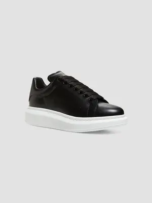 Alexander McQueen S Oversized Embossed Logo Leather Sneakers - Black