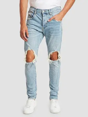 PURPLE BRAND P002 Repair Drop-fit Skinny Jeans