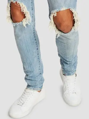 PURPLE BRAND P002 Repair Drop-fit Skinny Jeans
