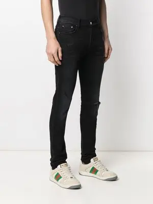 Amiri Distressed Skinny Jeans