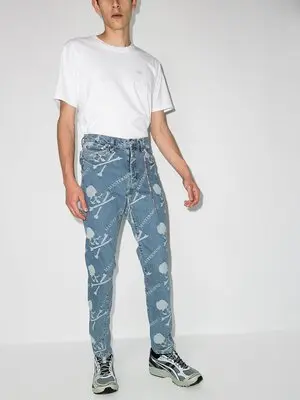 MASTERMIND WORLD All-over Logo Lim-fit Jean