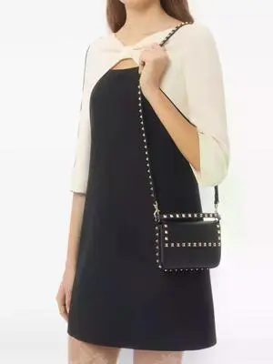 Valentino Garavani Rockstud Grainy Calfskin Pouch With Platinum-finish Studs - Black