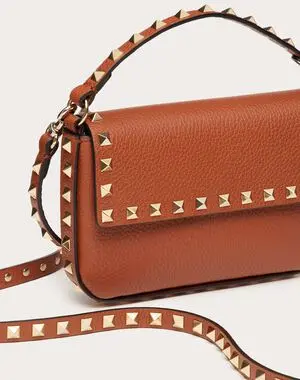 Valentino Garavani Rockstud Grainy Calfskin Pouch - Saddle Brown