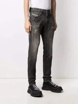 DIESEL® Faded Effect Distressed Jeans