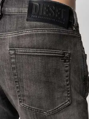 DIESEL® Faded Effect Distressed Jeans