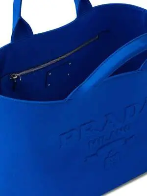Prada Logo-Embossed Drill Tote Bag - Blue | Editorialist
