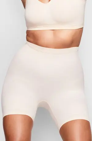 SKIMS Plus Size   Sculpting Mid Thigh Shorts Sand